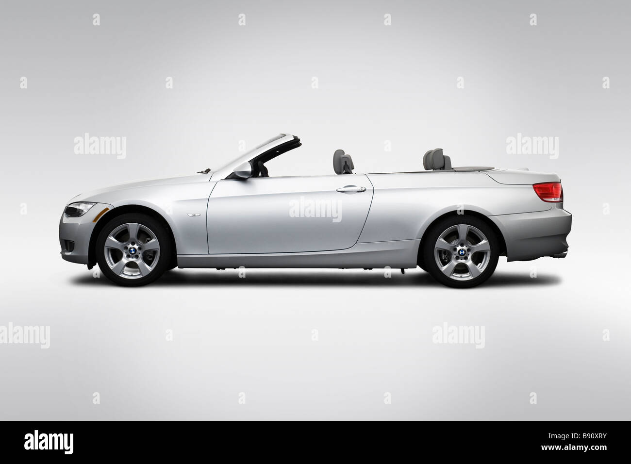 2009 BMW 3-series 328i in Silver - Drivers Side Profile Stock Photo - Alamy