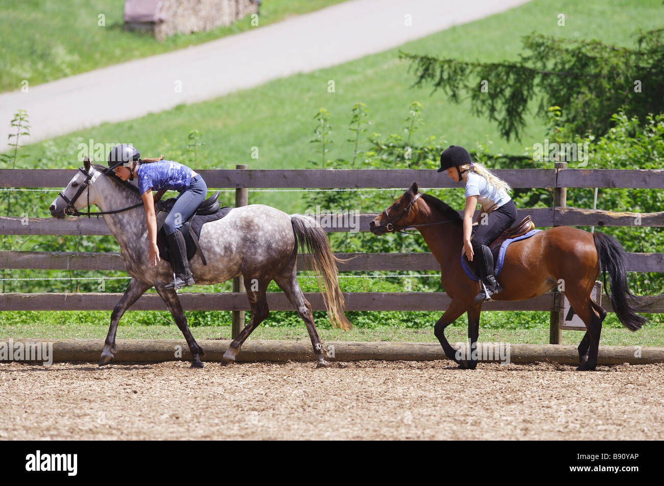 Two girls on ponies riding hi-res stock photography and images - Alamy