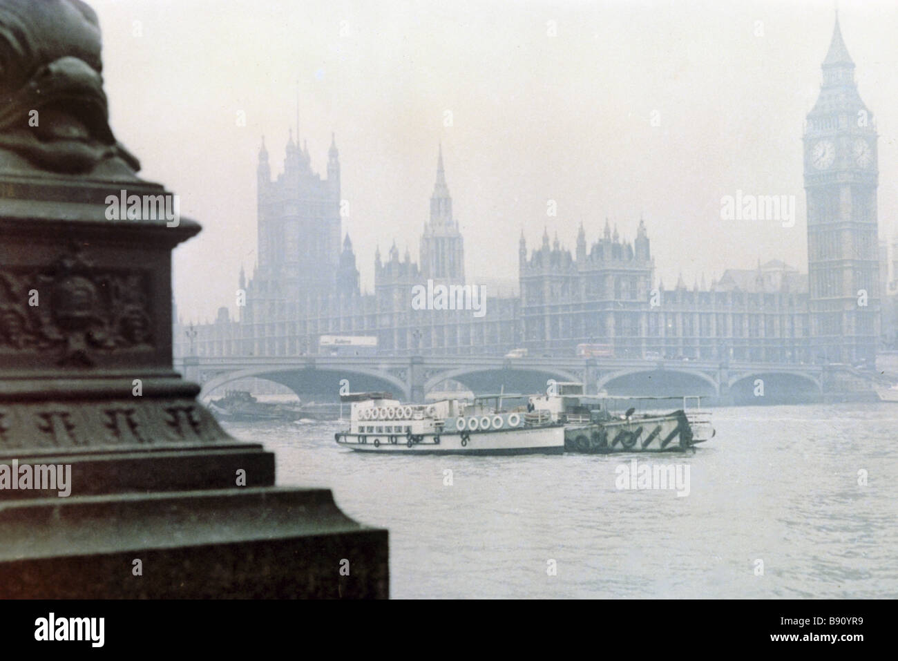 Barge floating along the Themes near the Tower Stock Photo - Alamy