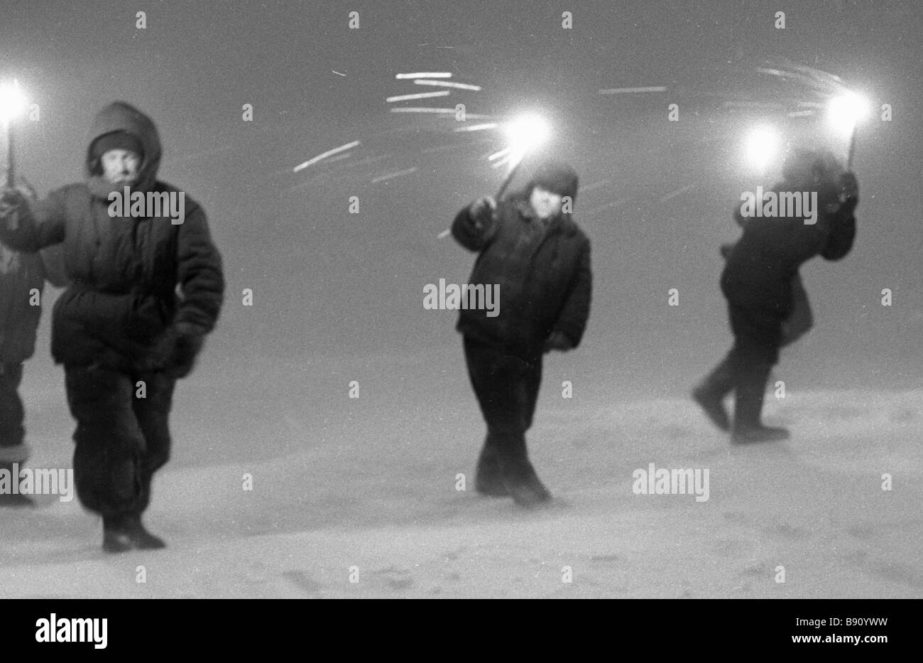 Staff of Severny Polyus 12 station with hand flares Stock Photo - Alamy