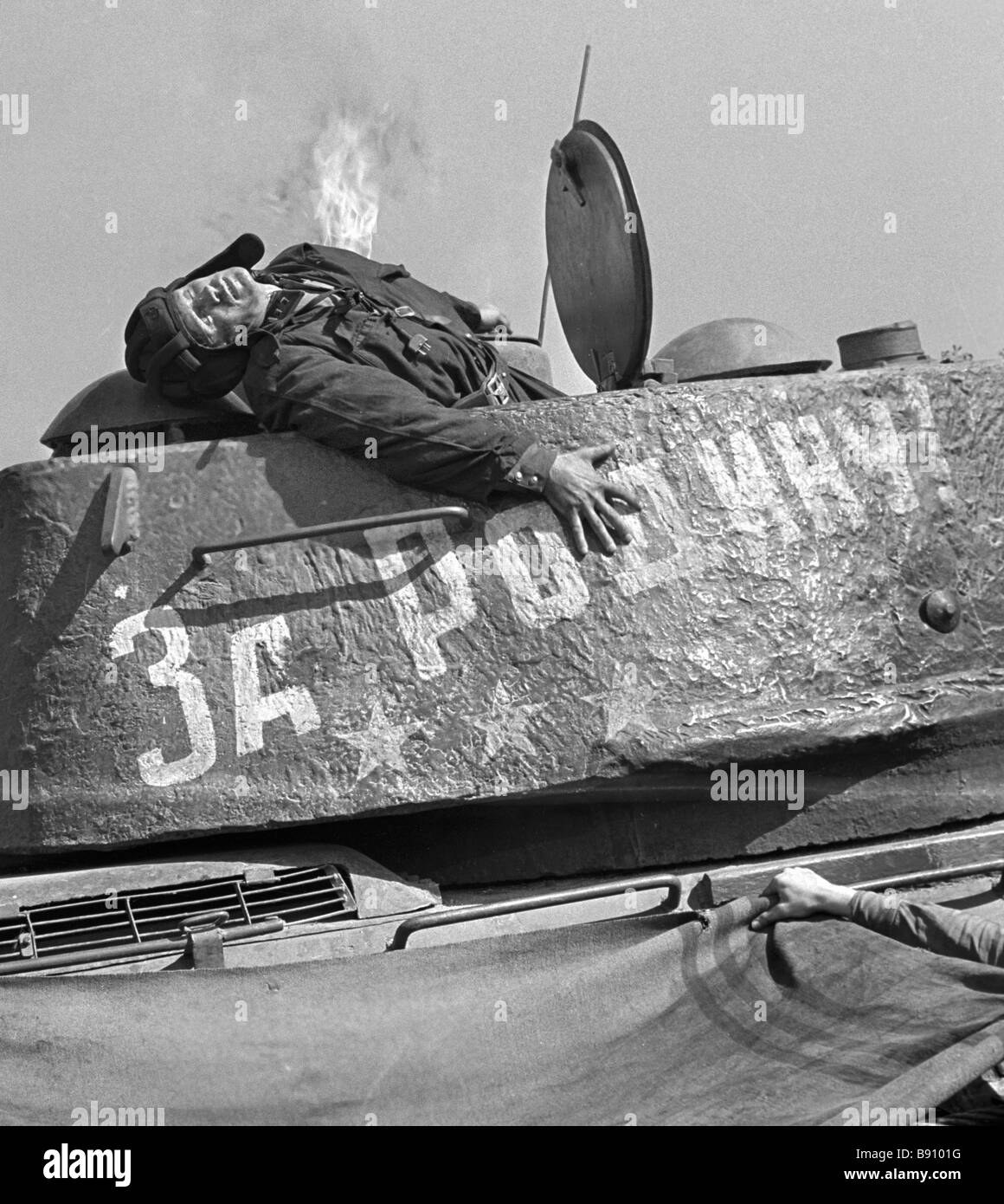 A dead tankman in a scene from the film Italiani Brava Gente Stock ...