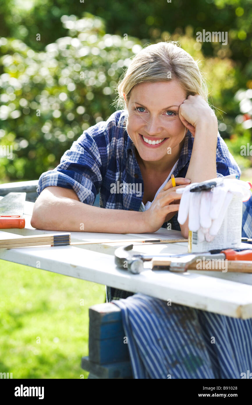 Woman renovating outside color hi-res stock photography and images - Alamy