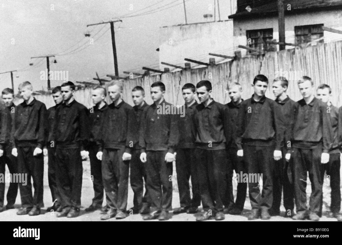 Juvenile correctional camp inmates on a walk A still from the ...