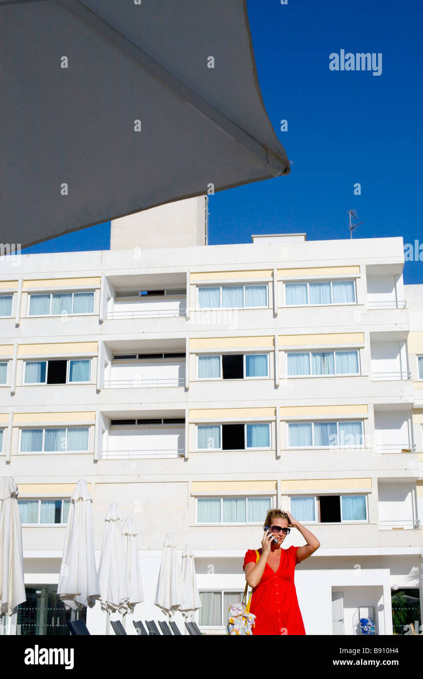 A Scandinavian tourist using a mobile phone Cyprus Stock Photo - Alamy