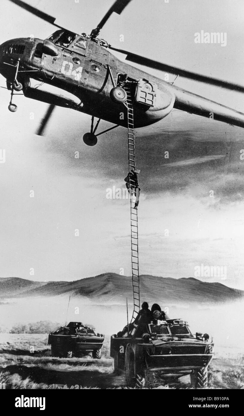 Messenger of ground reconnaissance unit climbs aboard helicopter ...