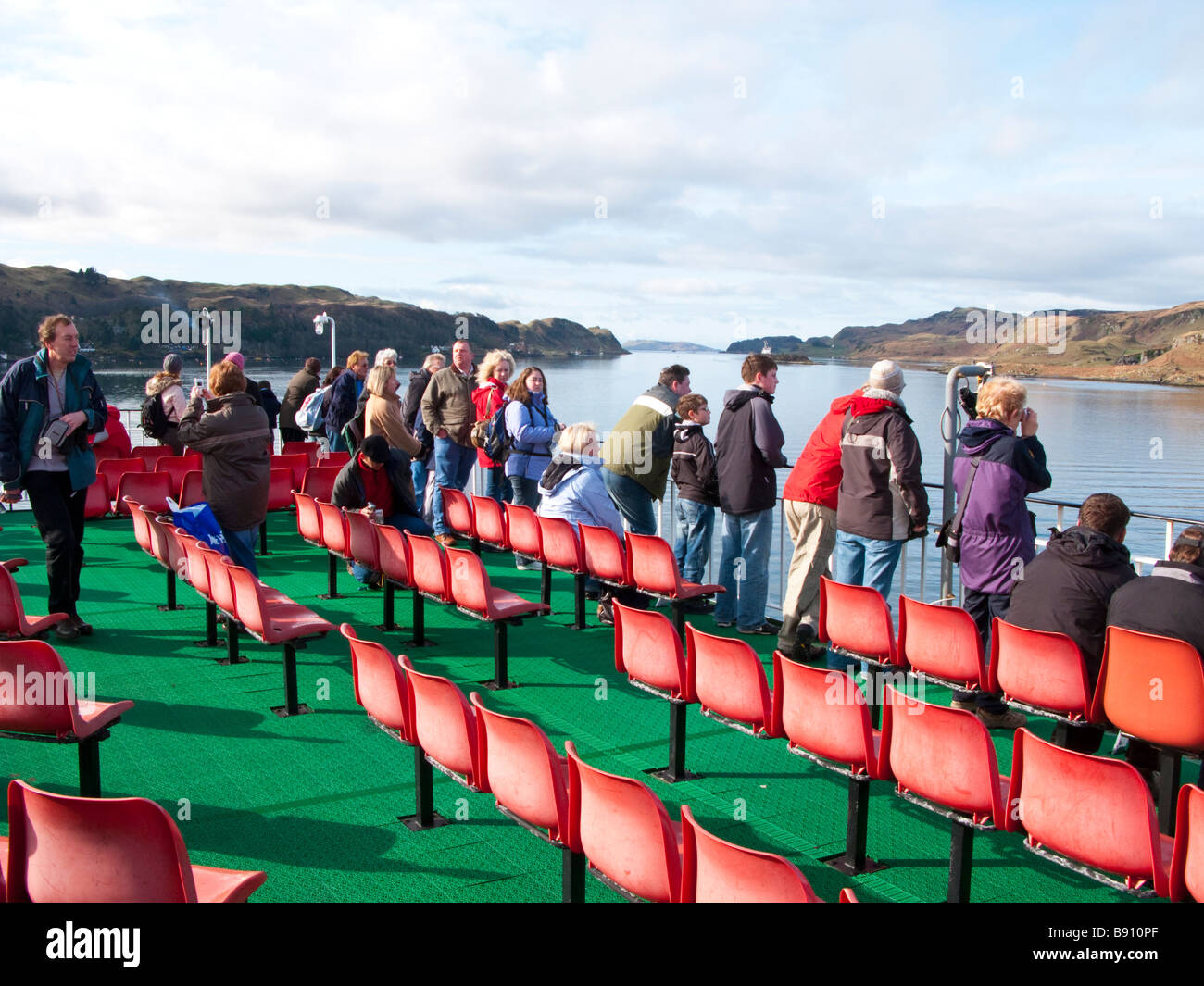 Tourists on board the Mull ferry leaving Oban Stock Photo - Alamy