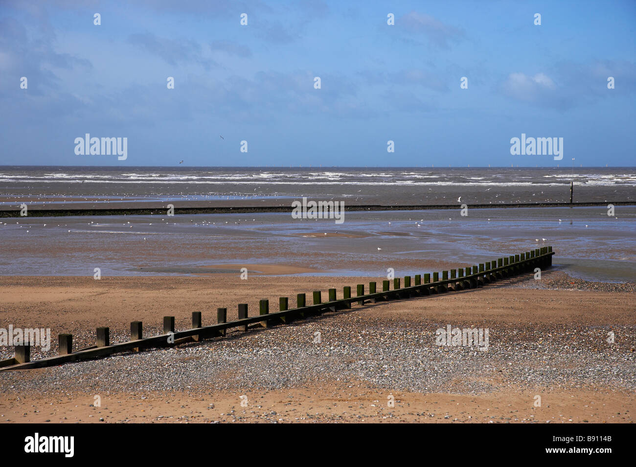 Beach and breakwater in Rhyl UK Stock Photo - Alamy