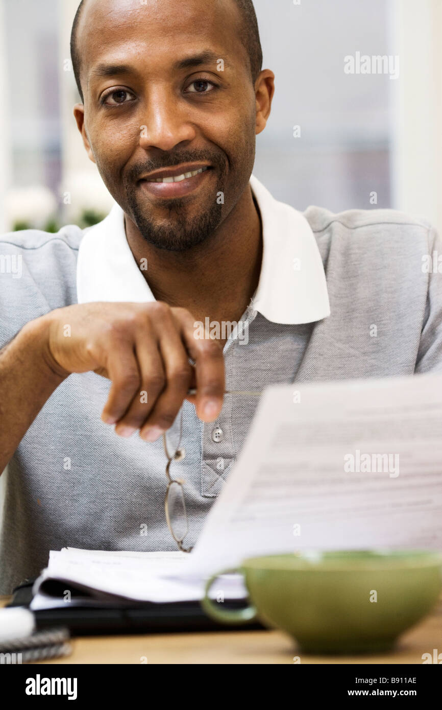 A man paying the bills Sweden Stock Photo - Alamy