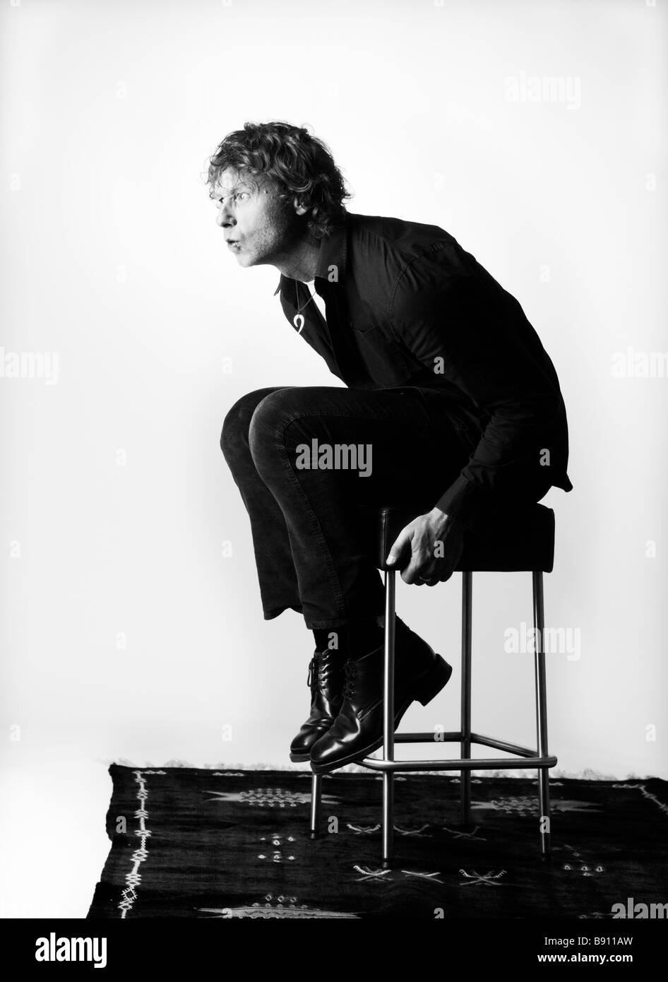 Human footstool Black and White Stock Photos & Images - Alamy