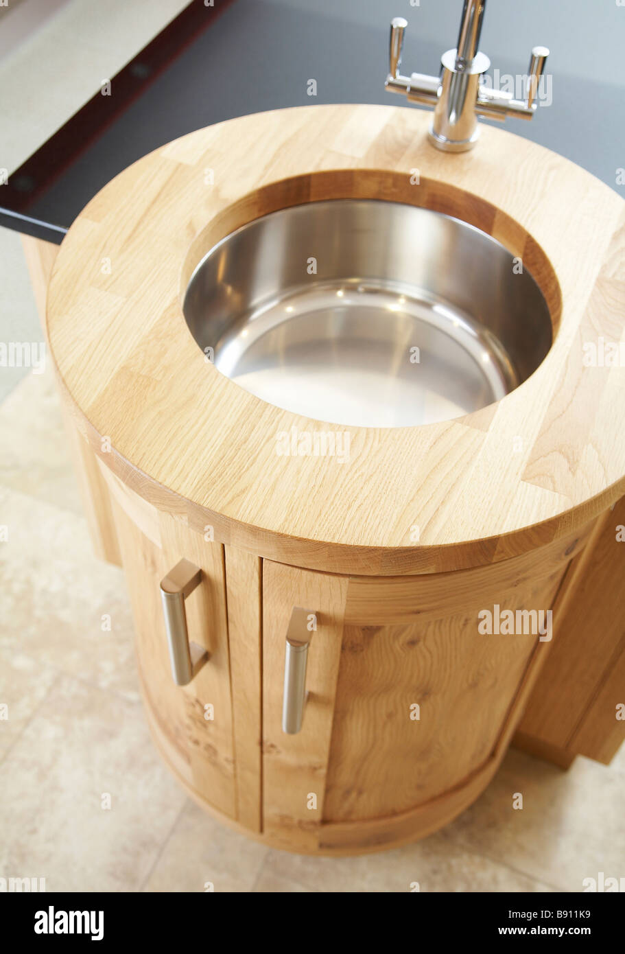 A bespoke circular kitchen sink Stock Photo - Alamy