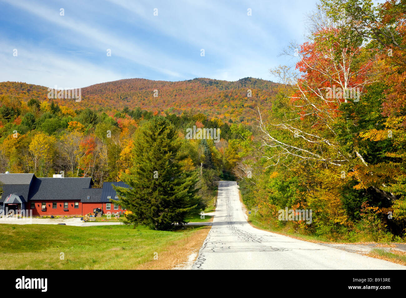 Roadway and farm with red barn in rural Vermont, USA, America Stock ...