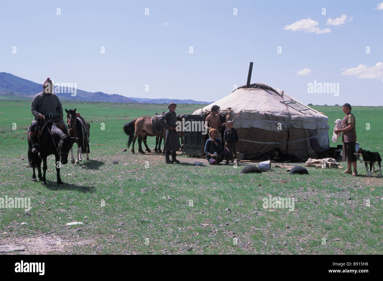 Mongolian Nomad Family In Traditional Stock Photos & Mongolian Nomad ...