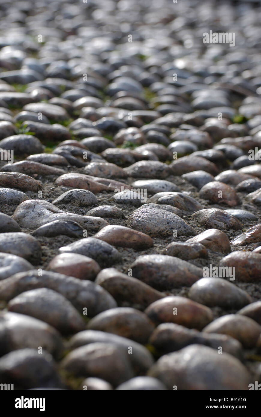 Round cobblestones hi-res stock photography and images - Alamy