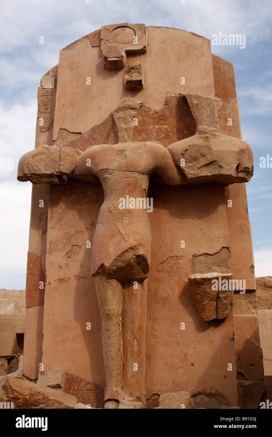Headless stone statue of an Egyptian pharaoh, Karnak Temple, Luxor ...