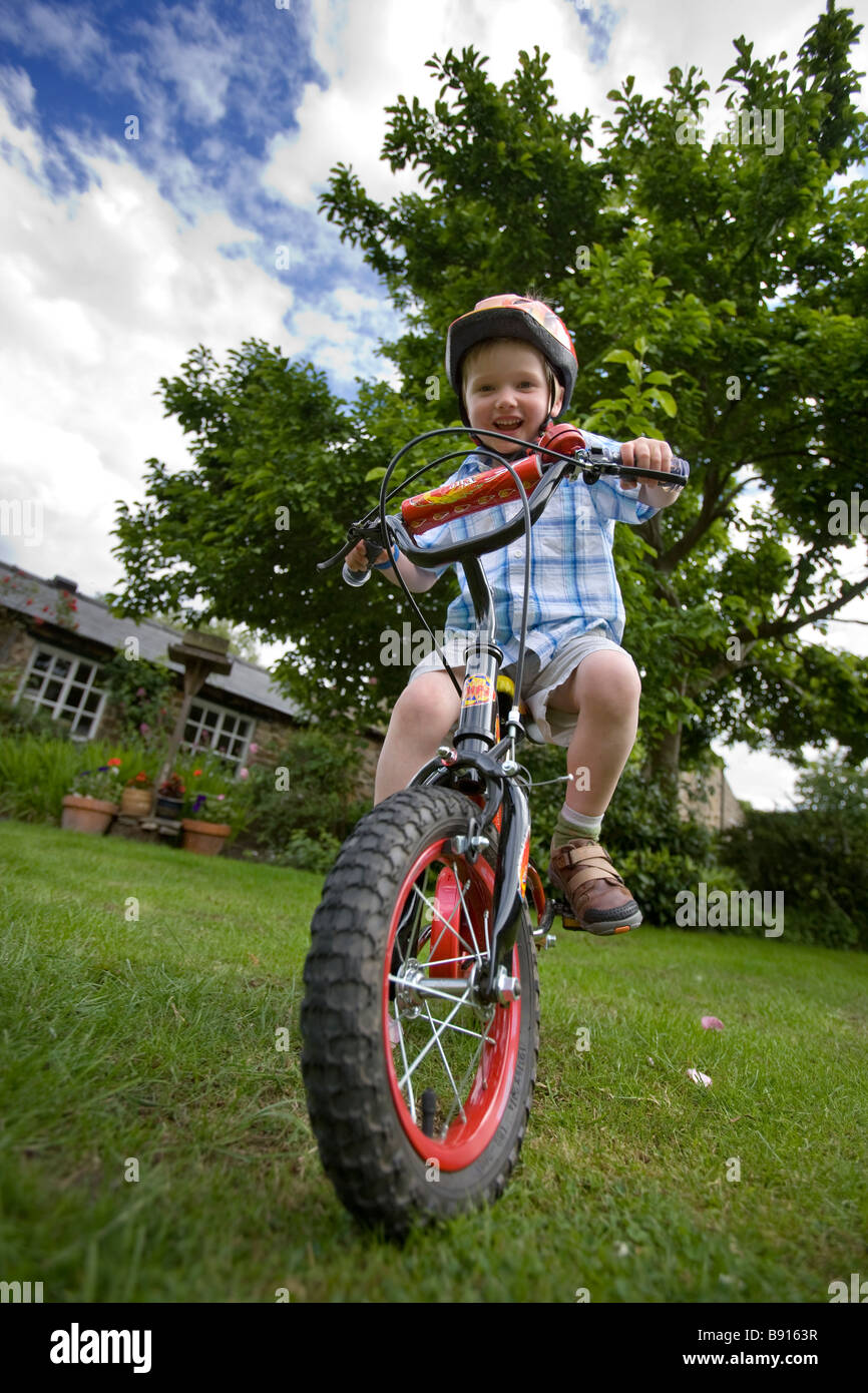 Boy on his bike Stock Photo - Alamy