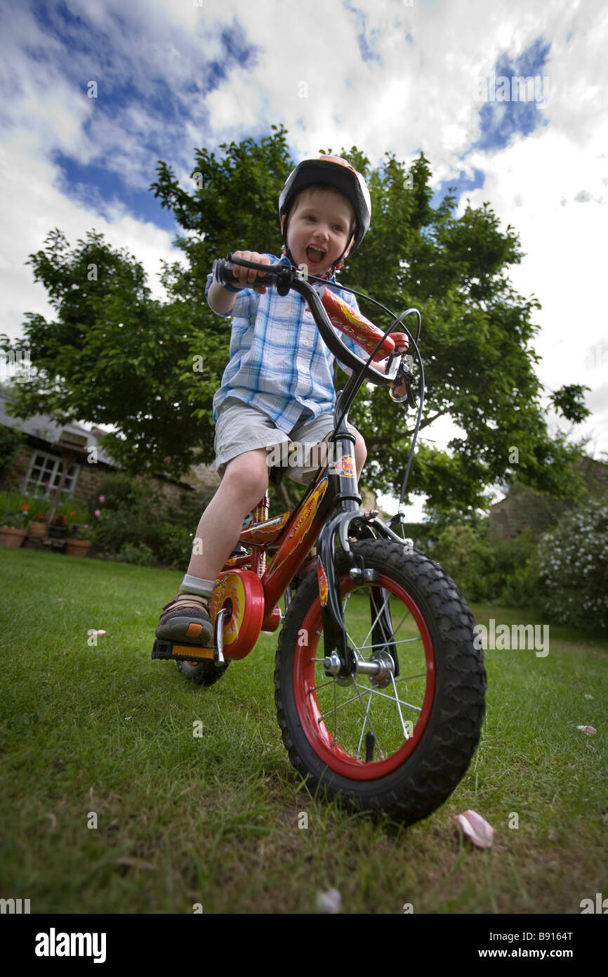 Boy on his bike Stock Photo - Alamy