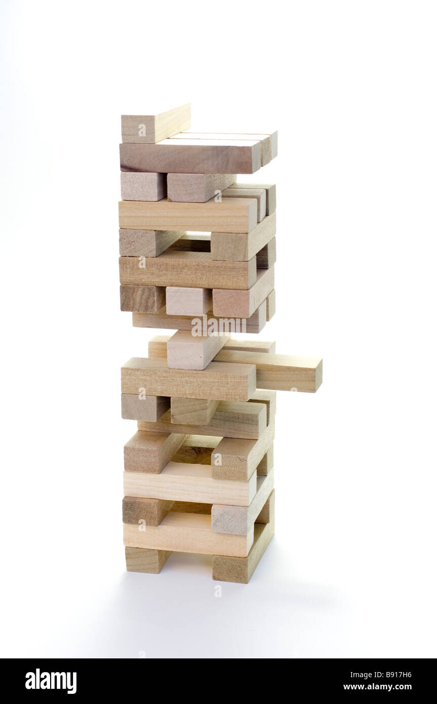 a tower constructed from jenga blocks Stock Photo - Alamy