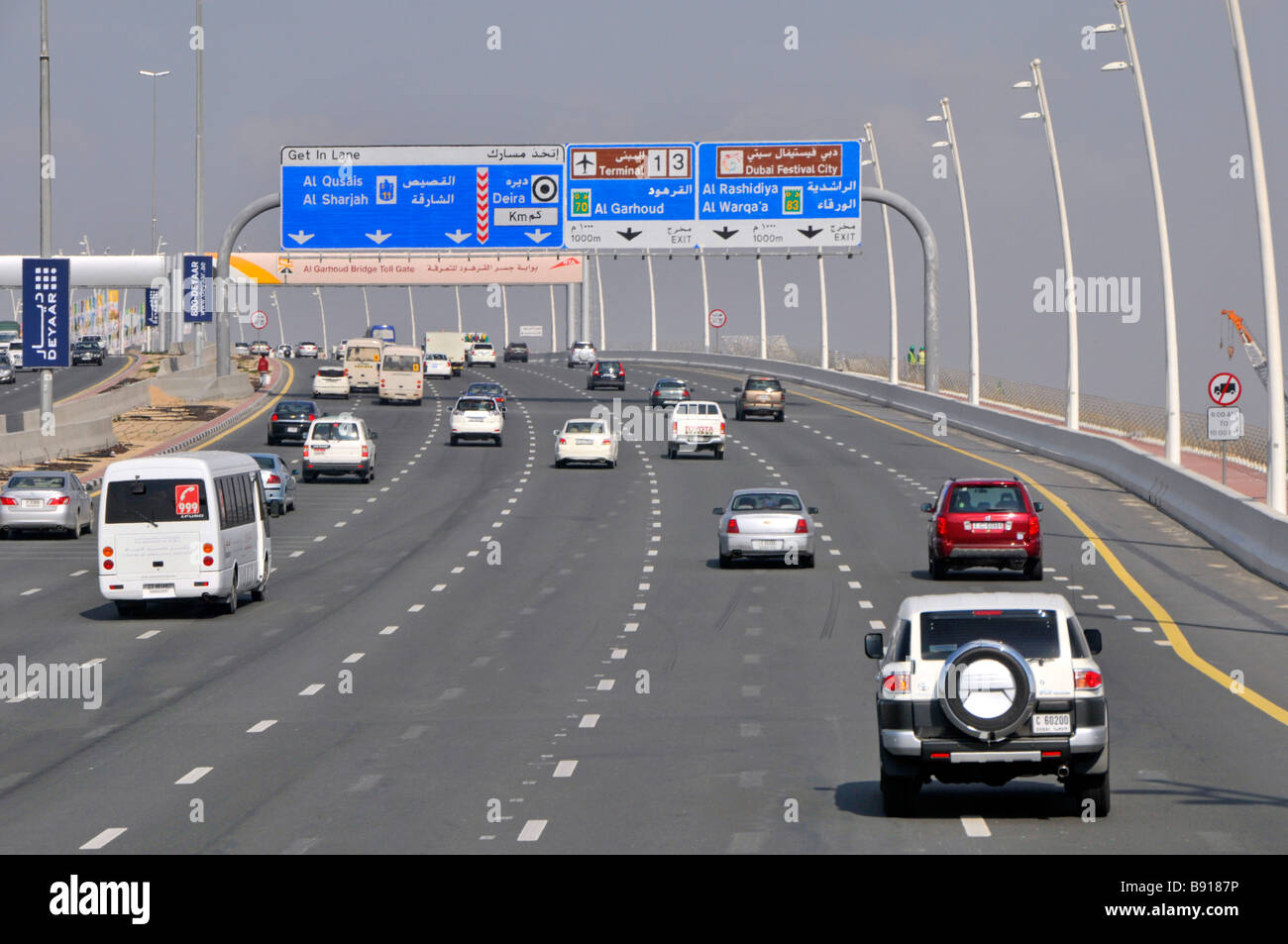 Dubai seven lane motorway and gantry signs leading to the Al Garhoud ...