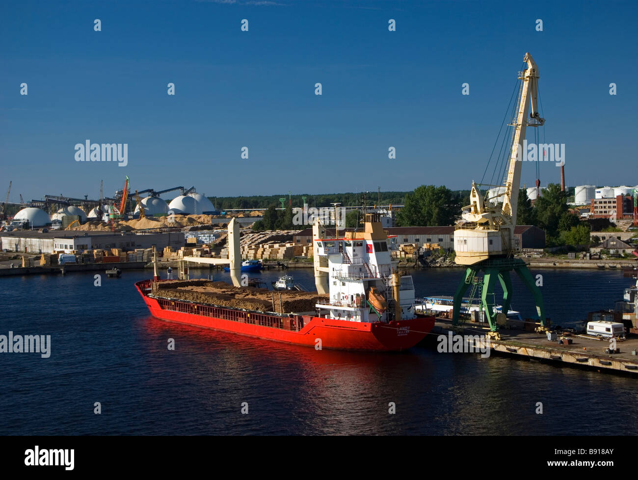 Timber handling terminal in Riga harbor Stock Photo - Alamy