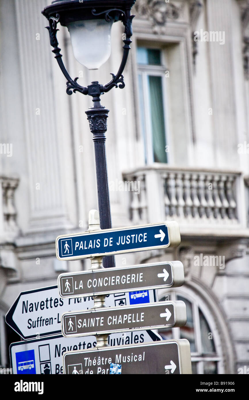 Lamppost with public information signs attached Stock Photo - Alamy