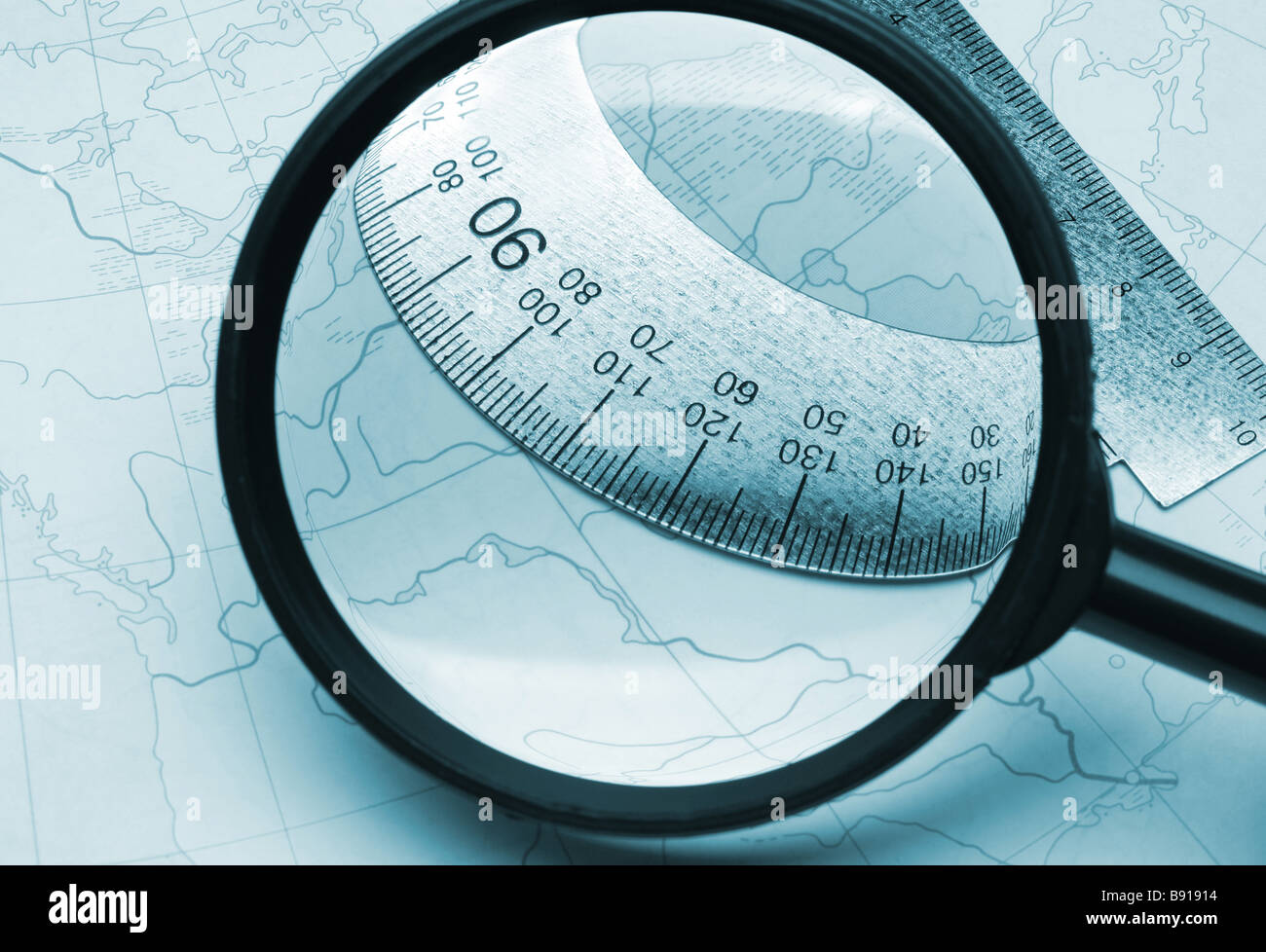 magnifier and card Magnifying glass above a card of the world Stock ...
