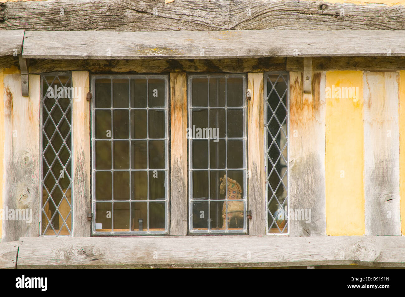 The mullioned leaded windows of a 17th century half timbered house UK ...