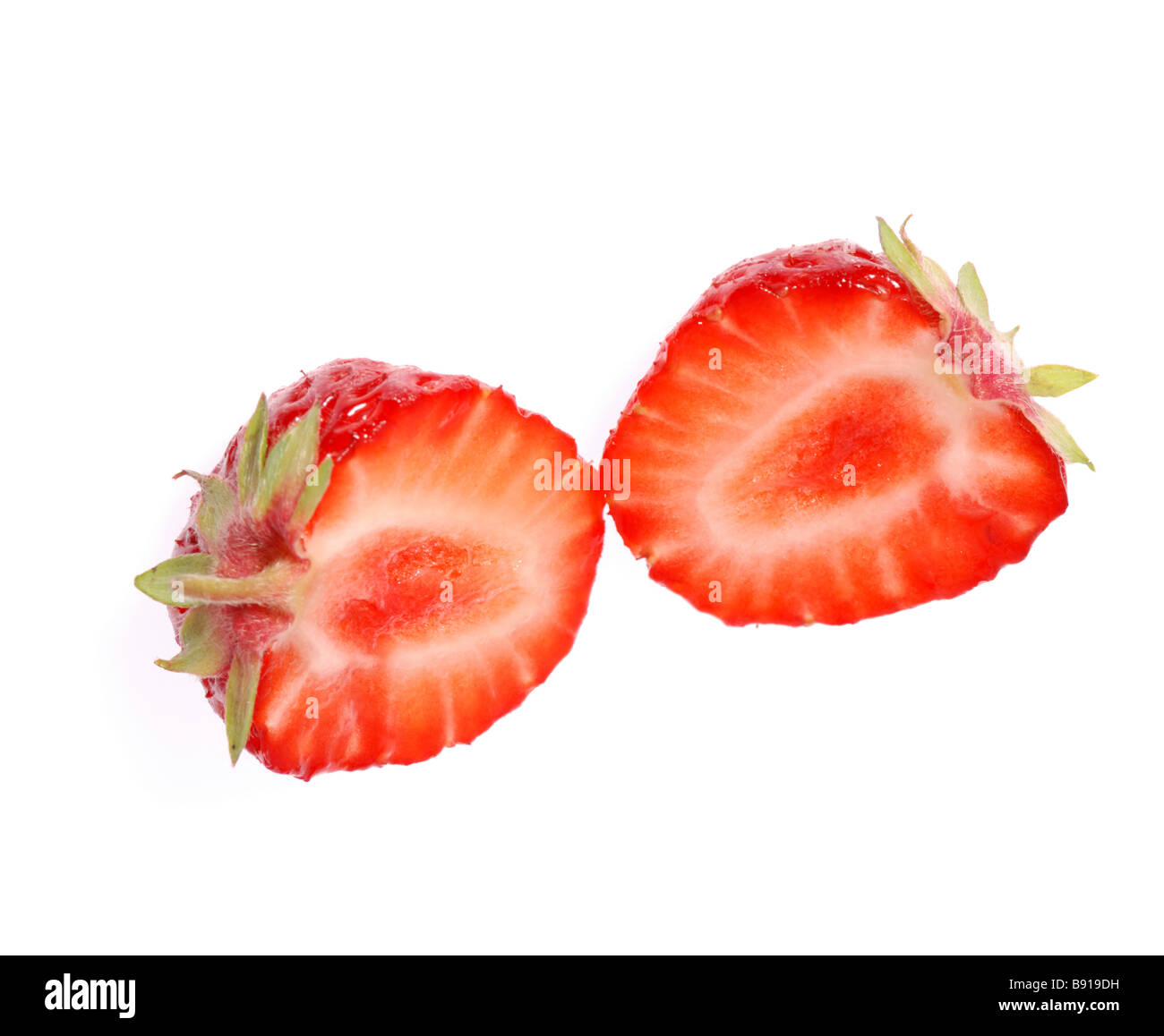 Strawberry cut A berry isolated on a white background Stock Photo - Alamy