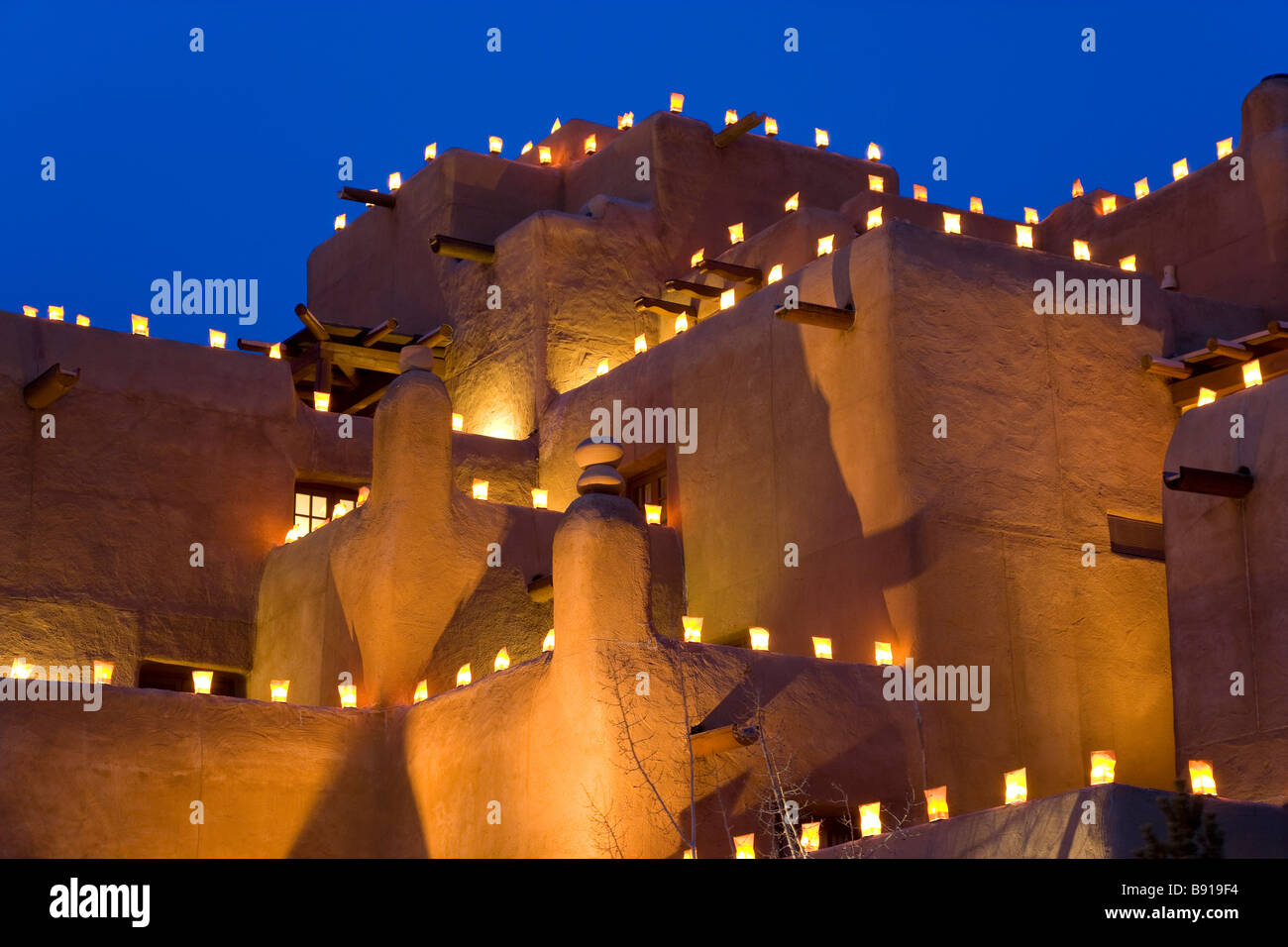 Lanterns lighting adobe building Santa Fe New Mexico USA Stock Photo ...