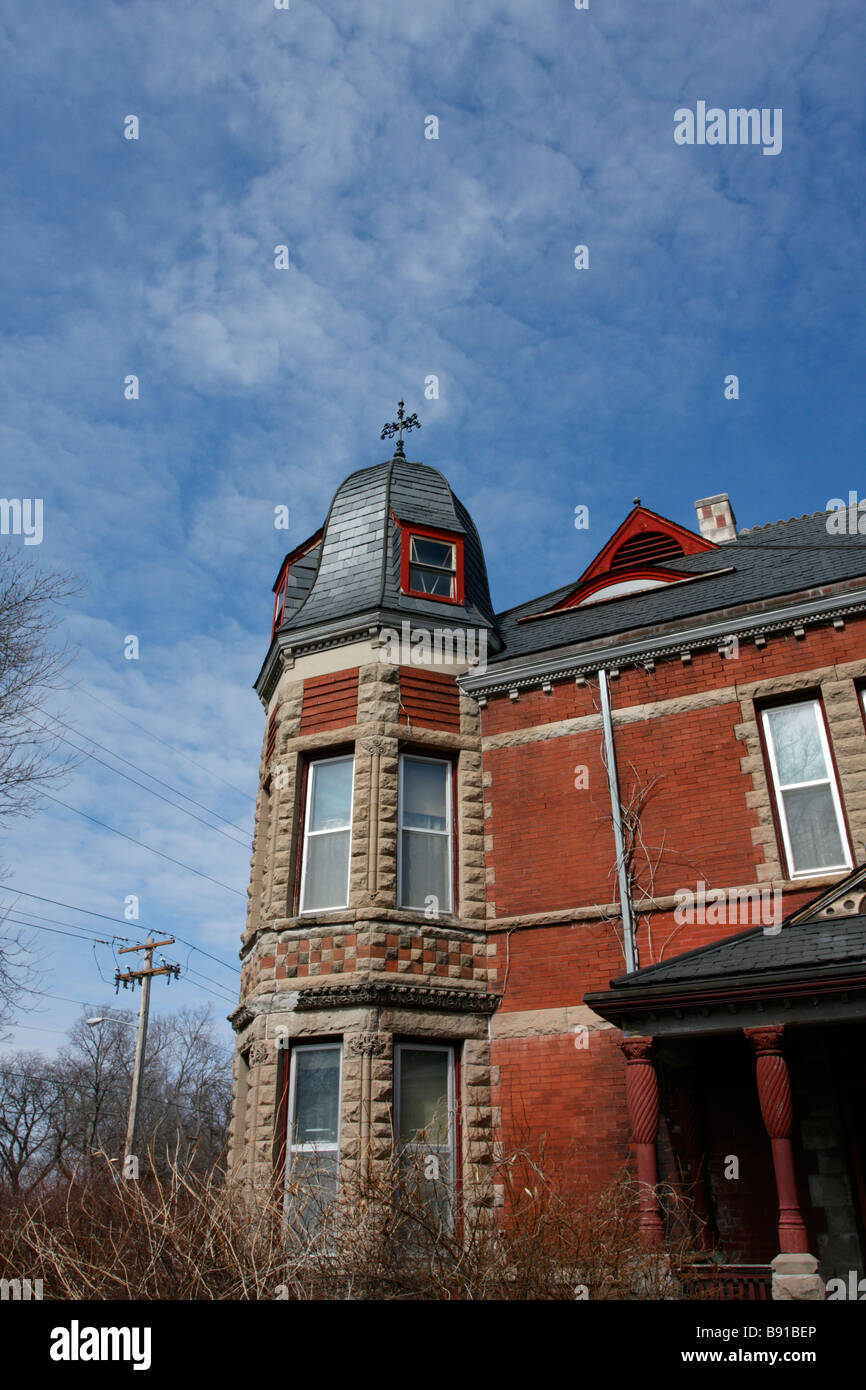 Turret with slate roof and brick and limestone sandstone construction ...