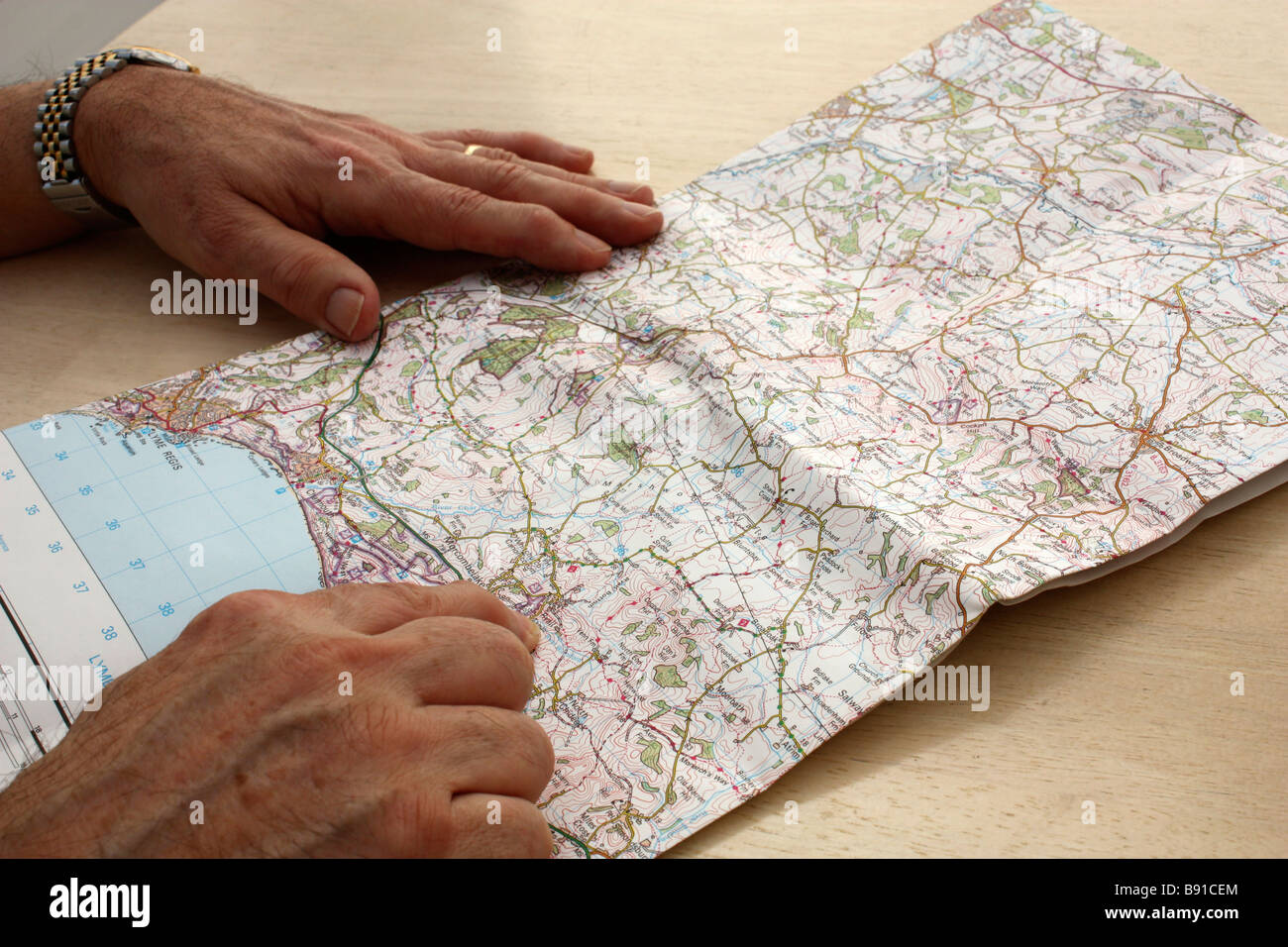 man Looking at a Map Stock Photo - Alamy