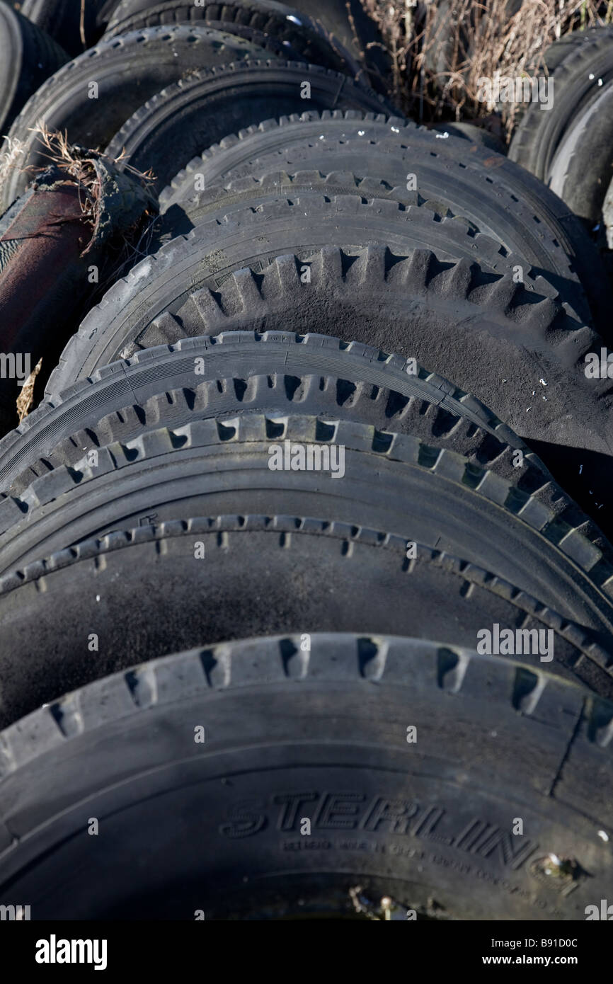 Old rubber tyres in a row Stock Photo - Alamy