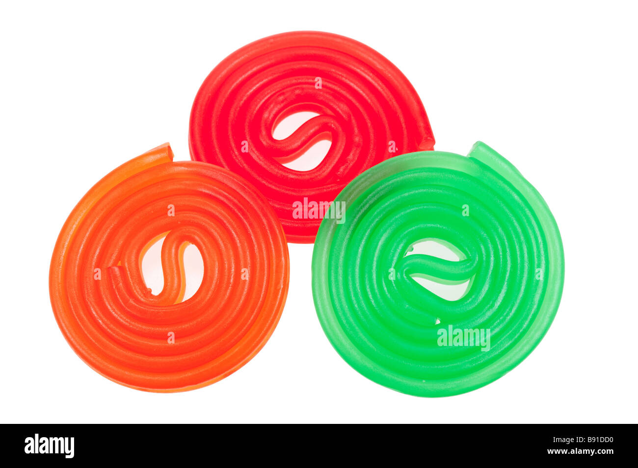 colorful rolls of candy isolated on a white background Stock Photo - Alamy