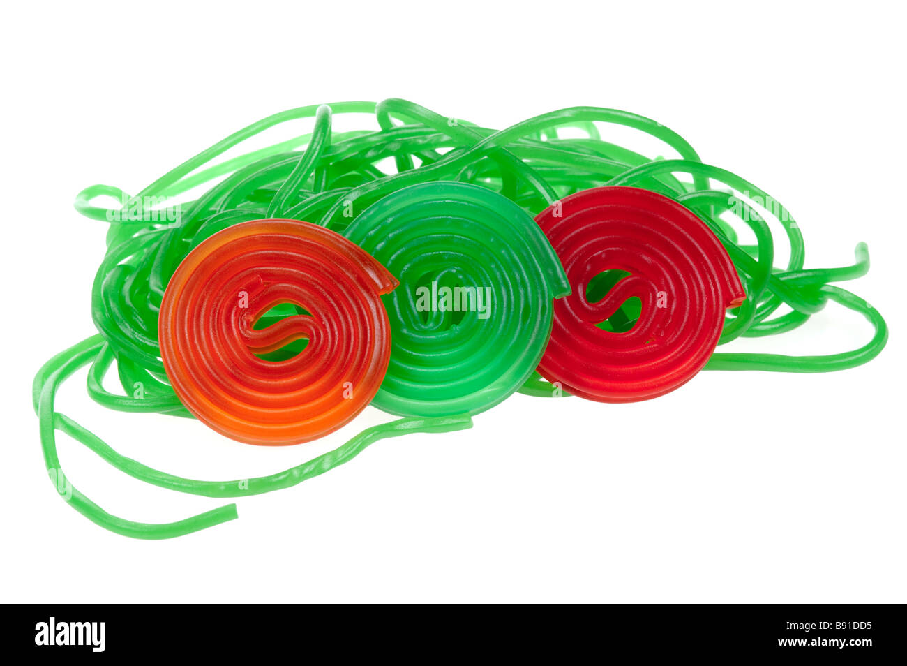 colorful rolls of candy isolated on a white background Stock Photo - Alamy