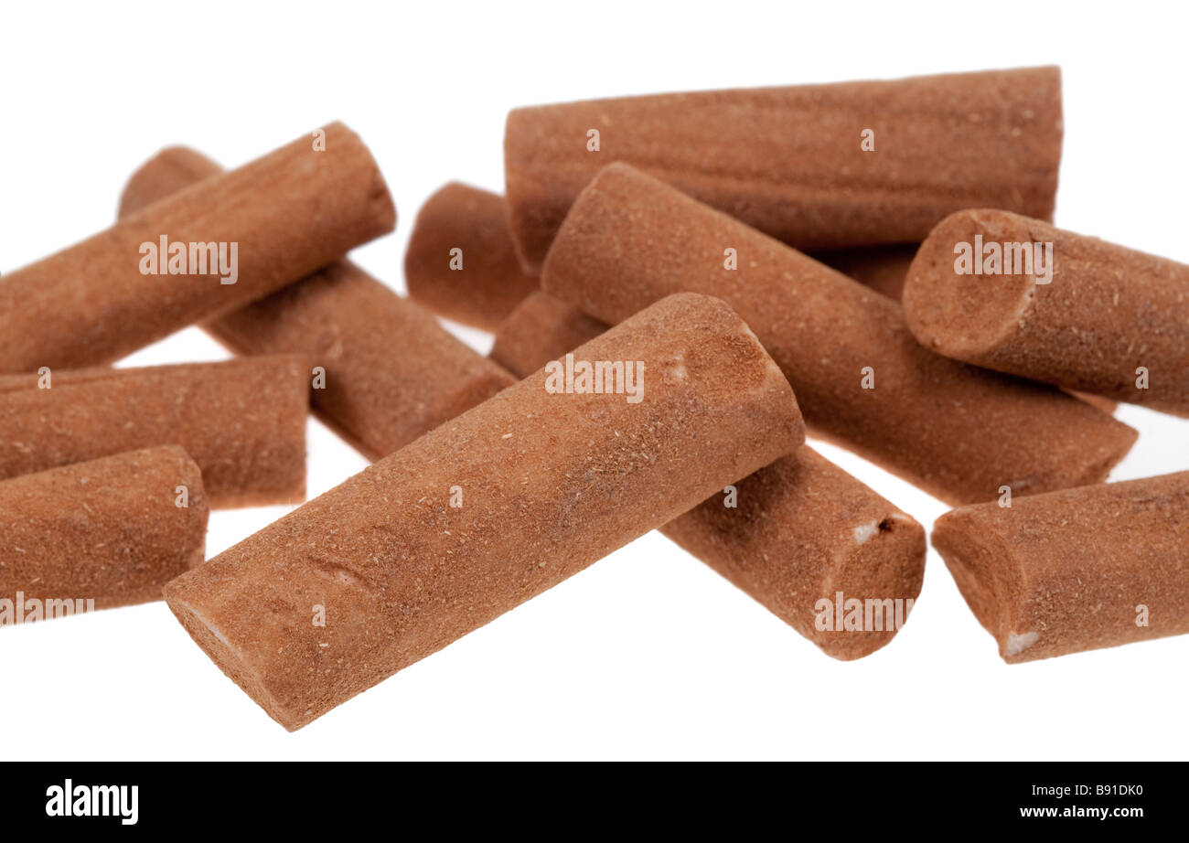 Cinnamon candy sticks isolated on a white background Stock Photo - Alamy