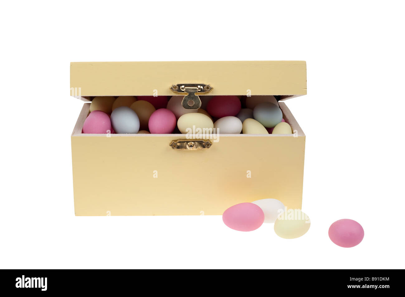 box of sugar covered almonds easter eggs isolated on a white background ...