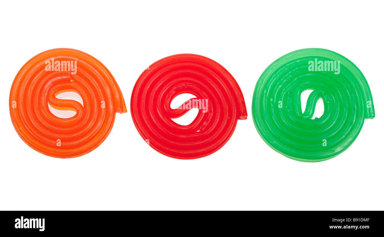 colorful rolls of candy isolated on a white background Stock Photo - Alamy