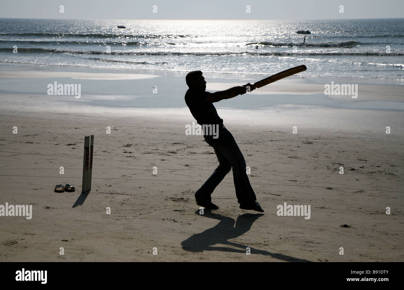 Cricket On The Beach Silhouette High Resolution Stock Photography and ...