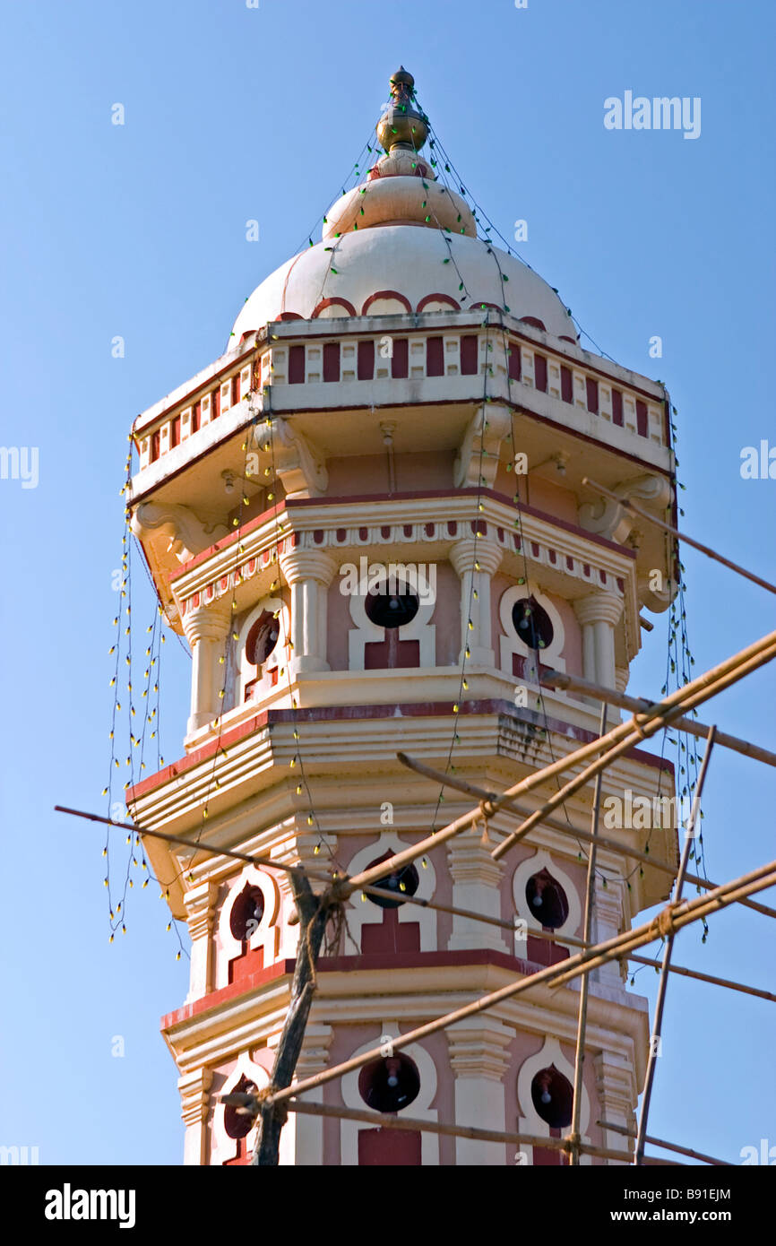 View on hindu temple lamp tower Stock Photo - Alamy