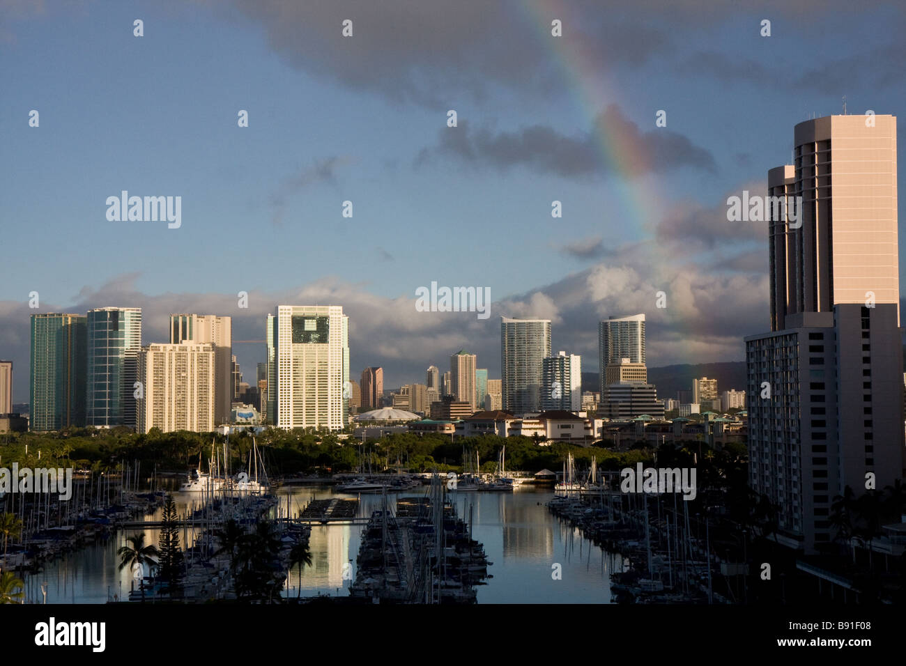 Honolulu skyline with rainbow Stock Photo - Alamy