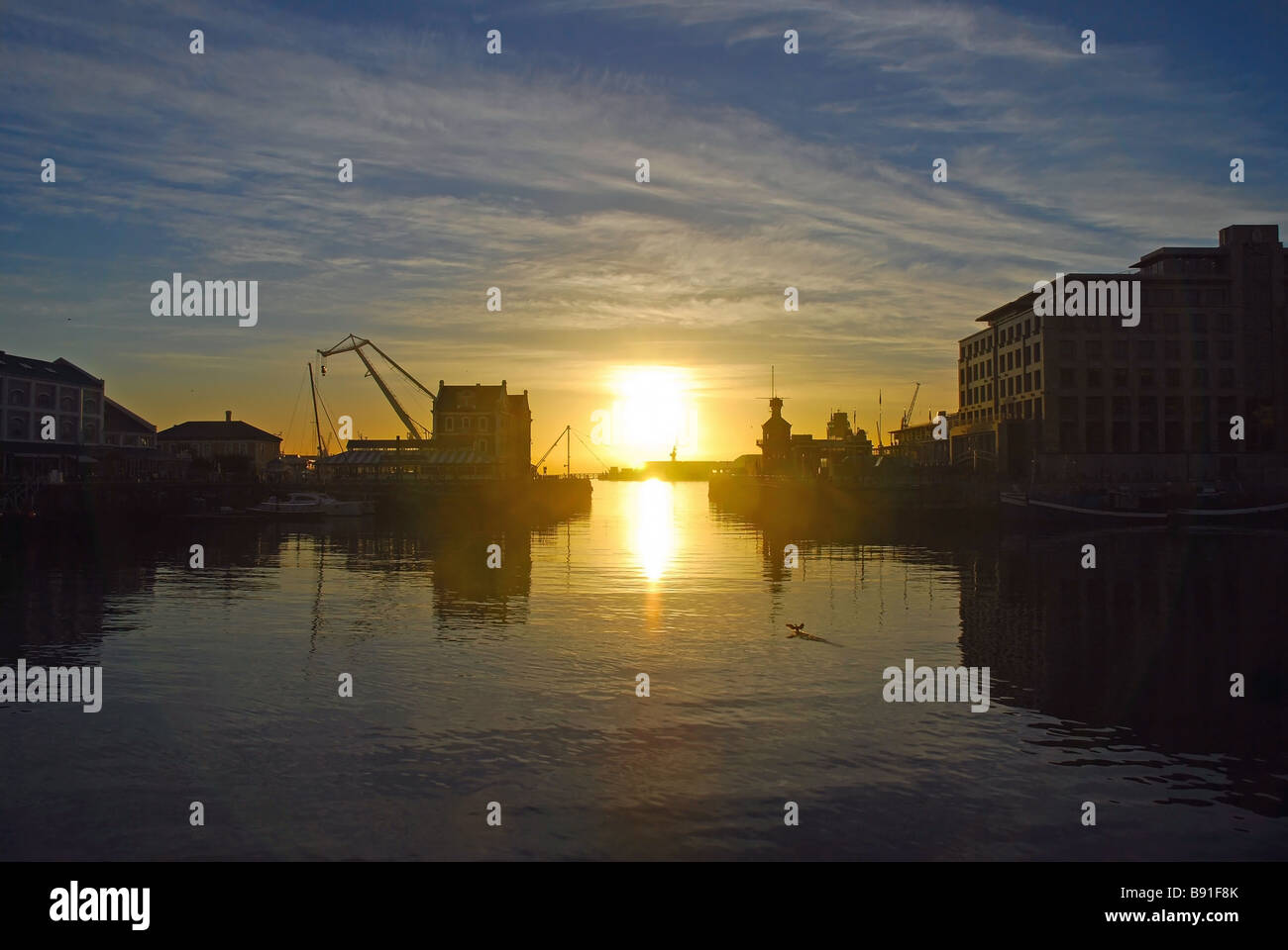 Red sunrise over the Alfred Basin, Victoria and Alfred Waterfront, Cape ...