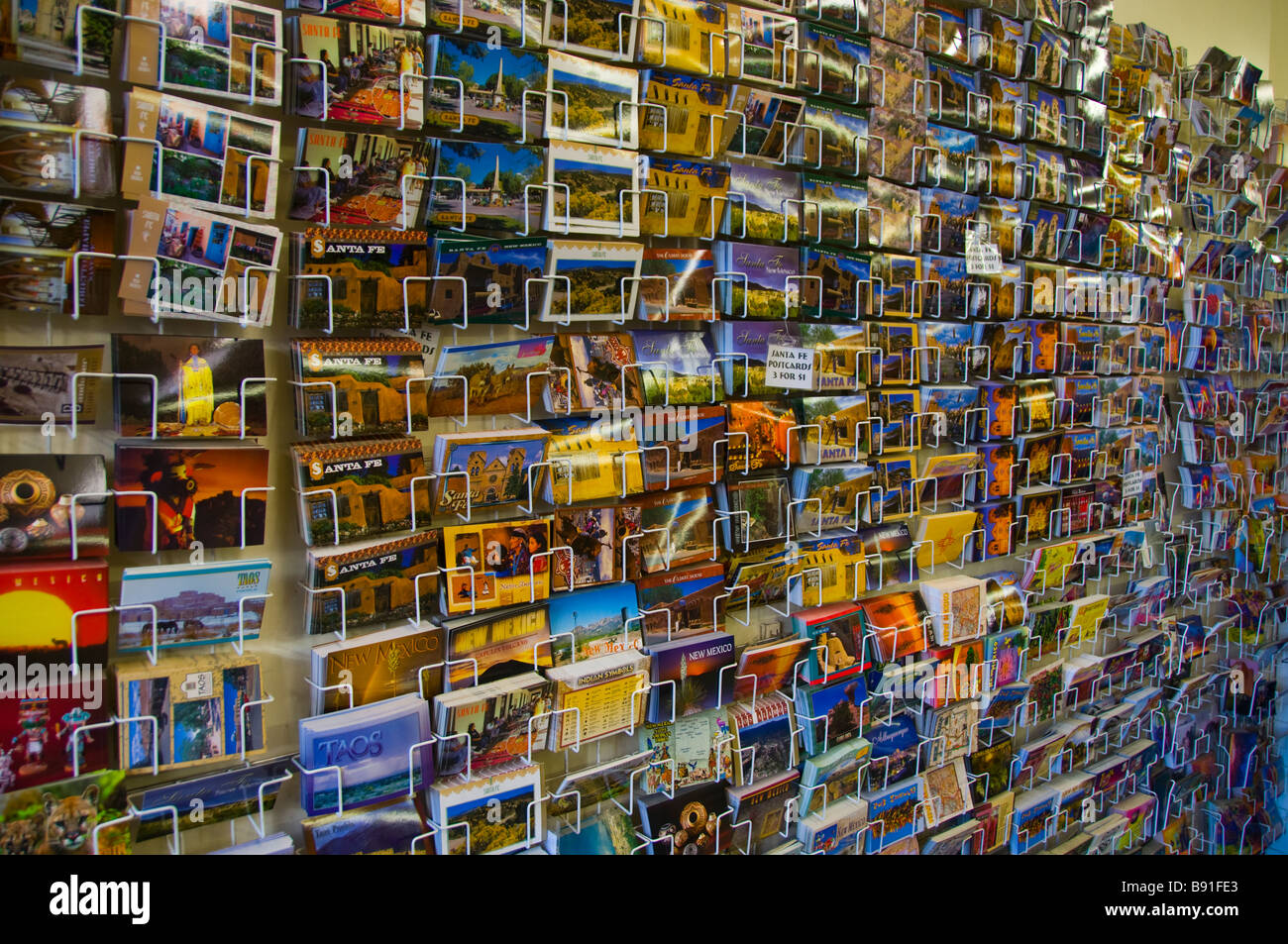 Wall display of travel postcards Stock Photo - Alamy