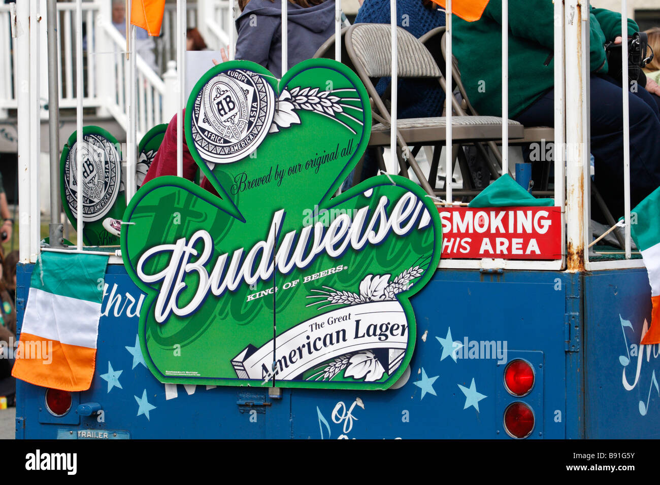 A Green Budweiser Beer Sign shaped like a clover in celebration of St ...