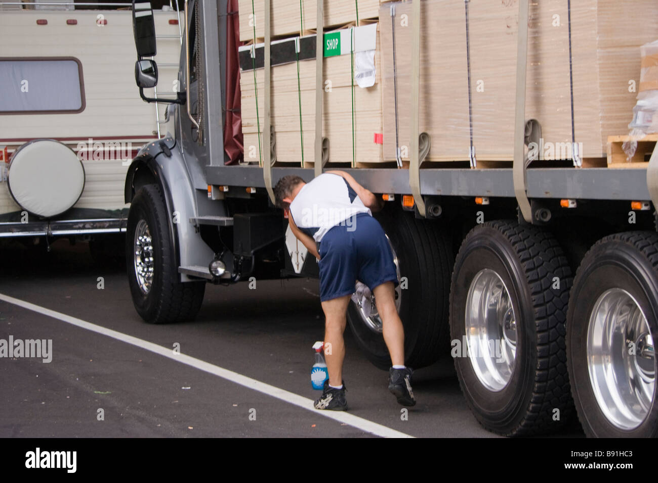 Caucasian trucker standing truck hi-res stock photography and images ...