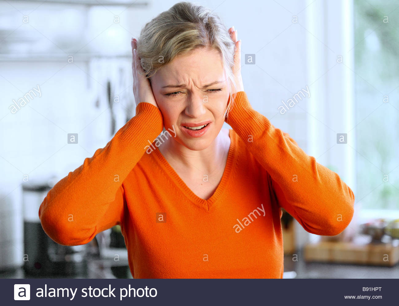 Holding Hands Over Ears High Resolution Stock Photography and Images ...