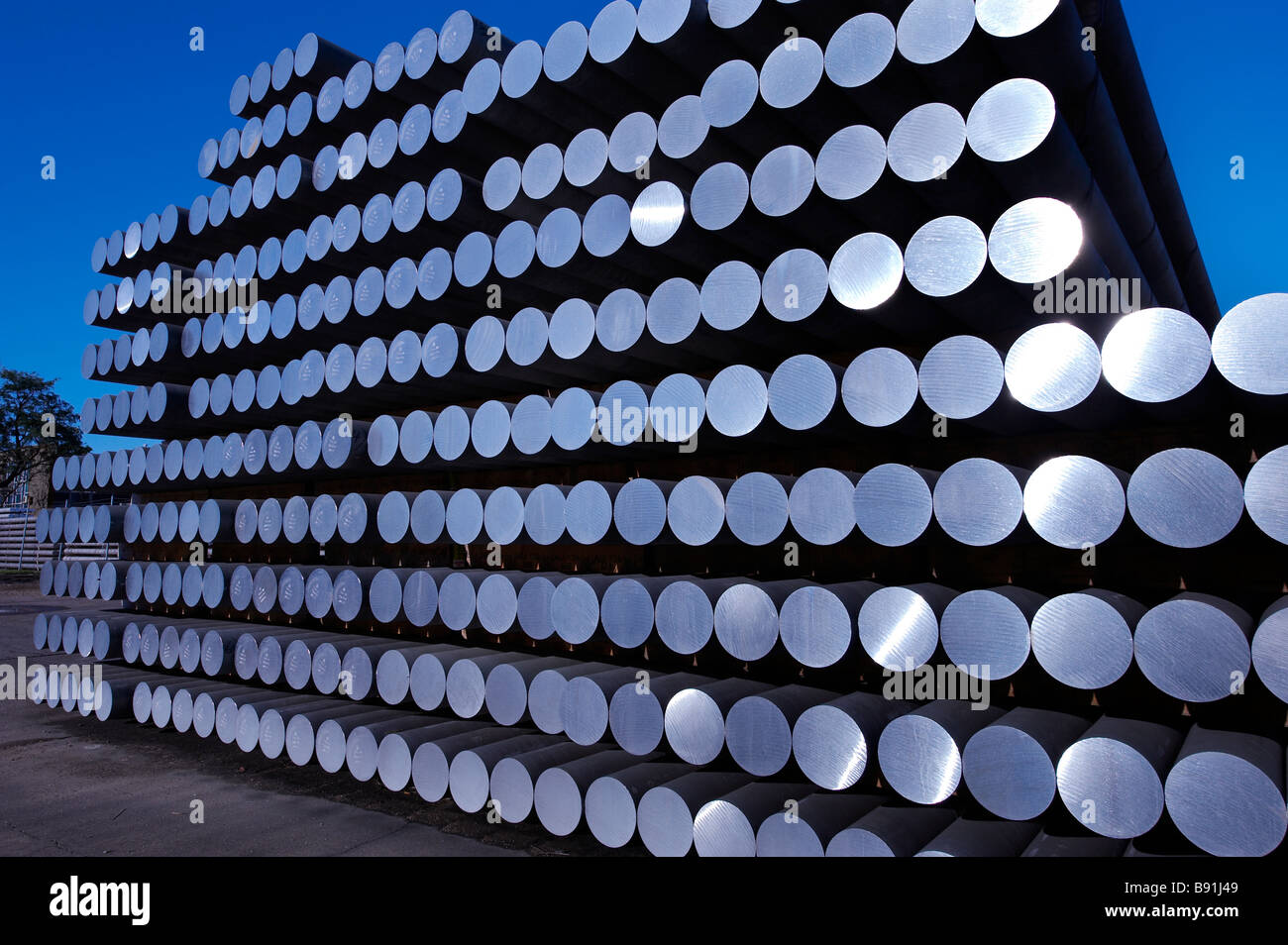 Aluminum rods stacked stack stacks pile piled up hi-res stock ...