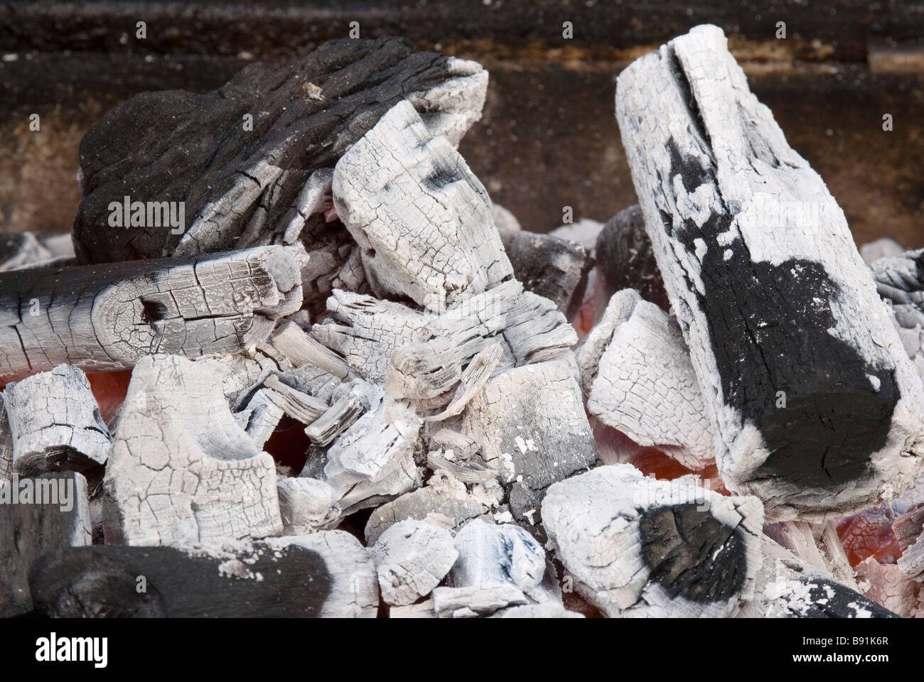 Wood coal burned on barbecue Stock Photo - Alamy