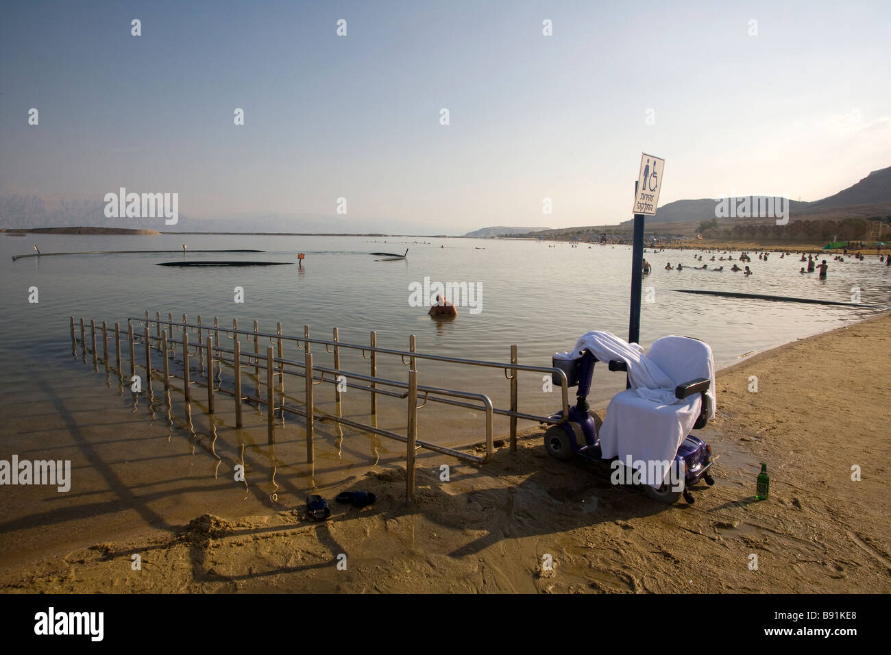 Mobility scooter on beach and disability ramp in Dead Sea, Israel ...