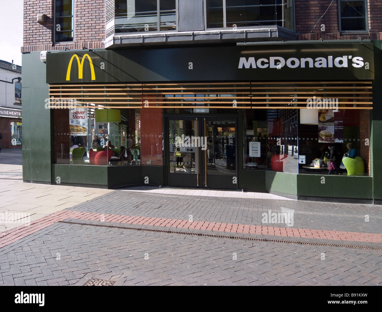 McDonald's café painted in new green livery Stock Photo - Alamy
