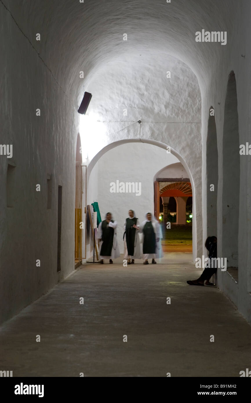 Nuns in the hallway of the convent in Izamal Mexico Stock Photo - Alamy