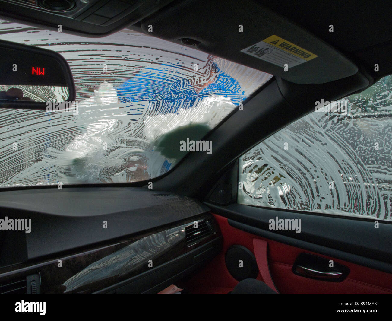 Car wash a view from inside the car during the car wash Stock Photo - Alamy